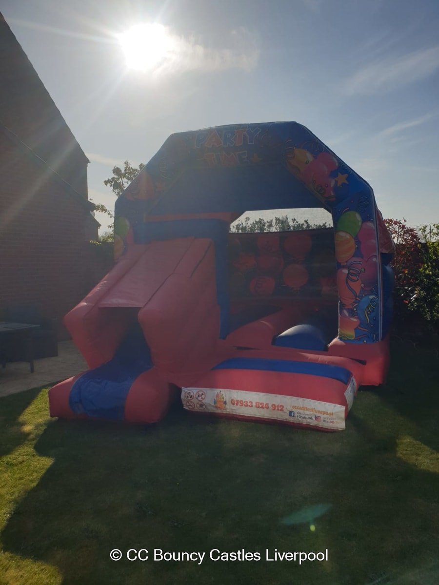 Party Time Castle with Slide Hire - Red & Blue | CC Castles Liverpool